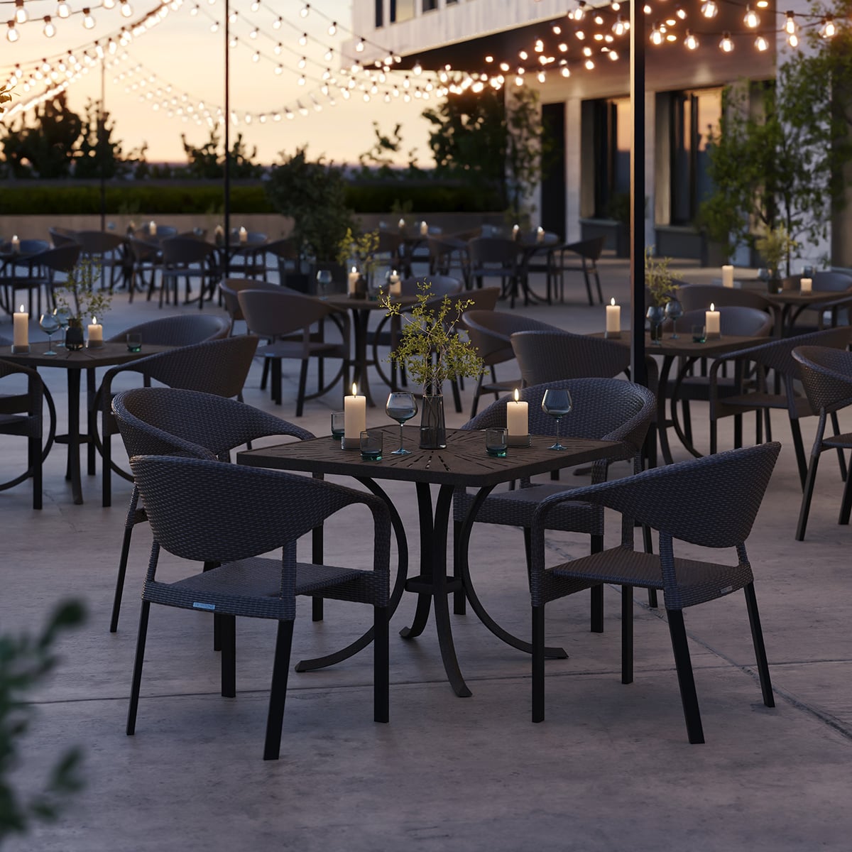 Tropitone Montara Woven Stacking Dining Chair - Luxury Outdoor Living ...